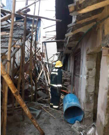 Photos: Tenants, construction workers escape death as 2-storey ...